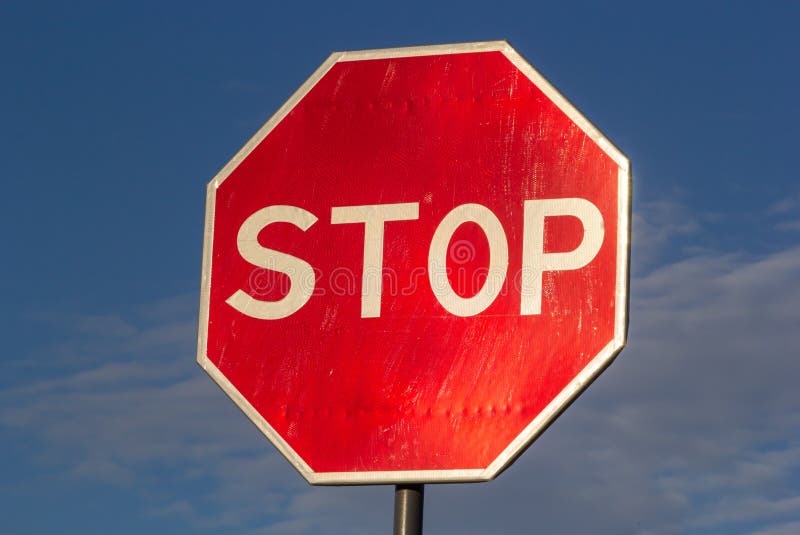 Red Stop Sign with Blue Sky and Clouds Background Stock Image - Image ...