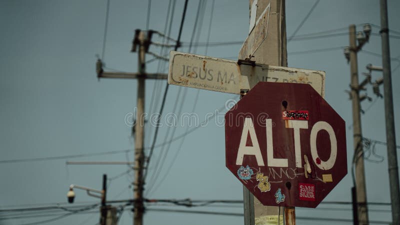 A Red Stop Sign with Graffiti on it Near a Pole Editorial Photo - Image ...