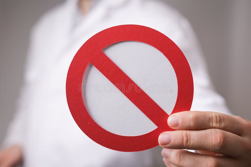 Red Stop Sign in the Hands of a Doctor Stock Image - Image of hospital ...