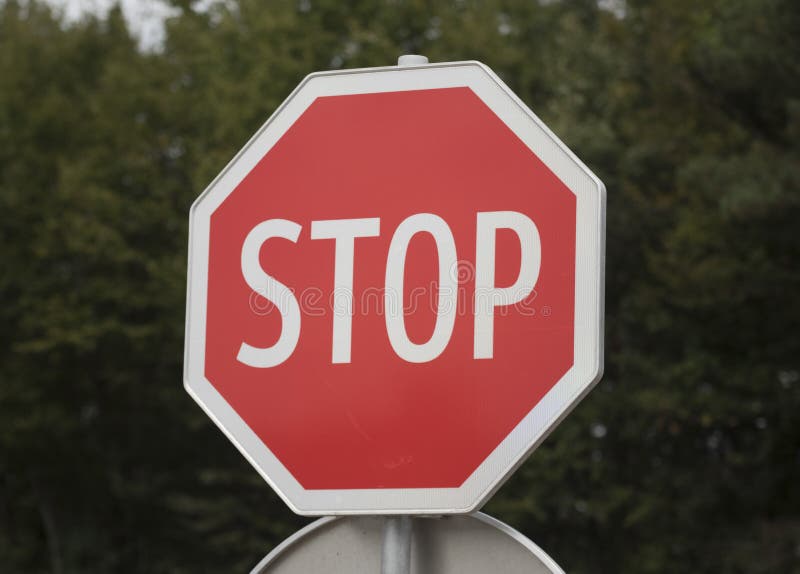 Red stop sign in traffic stock image. Image of management - 199126341