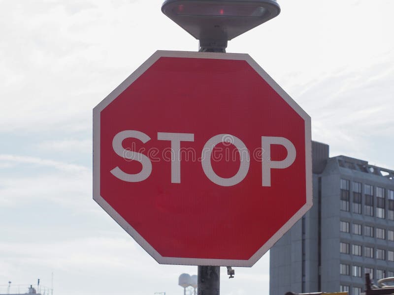 Stop sign at crossroad stock photo. Image of stop, signal - 98586206