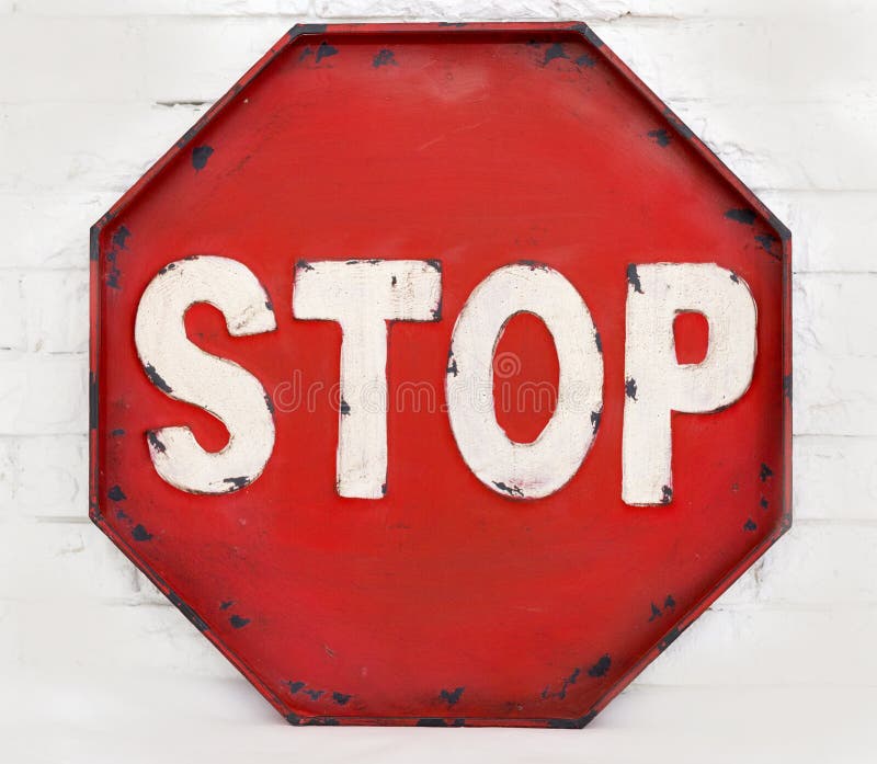 Red Stop Symbol On A White Brick Wall, Object. Stock Photo - Image of ...