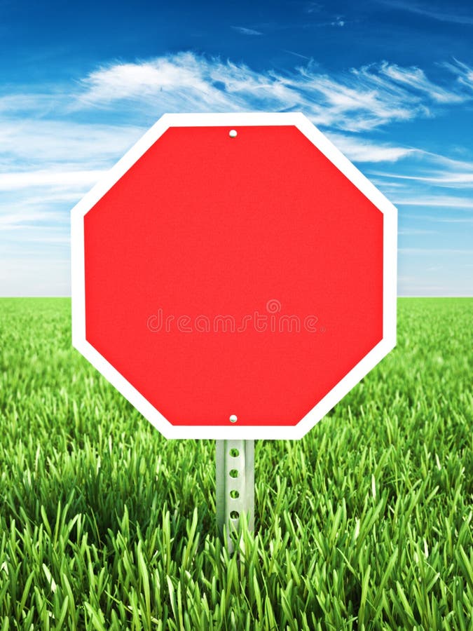 Red Stop Themed Sign Placed in a Field of Grass with Room for Text or ...