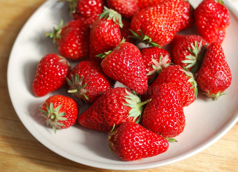 Strawberry in plate stock photo. Image of chopping, together - 30155022