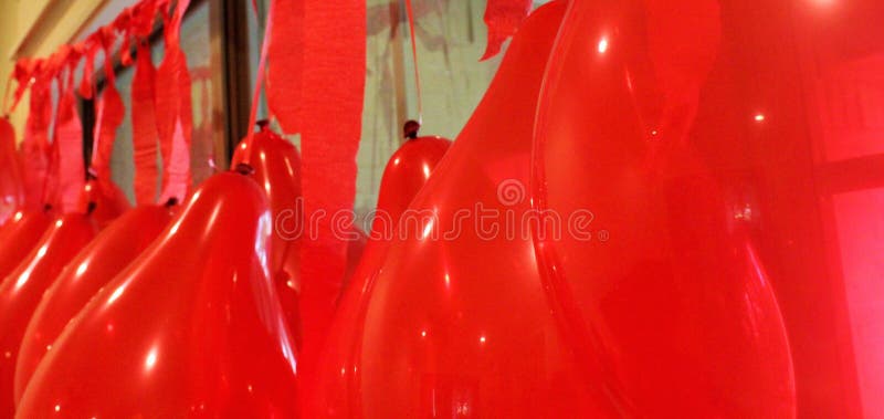Red streamer and balloon stock image. Image of detail - 93988955