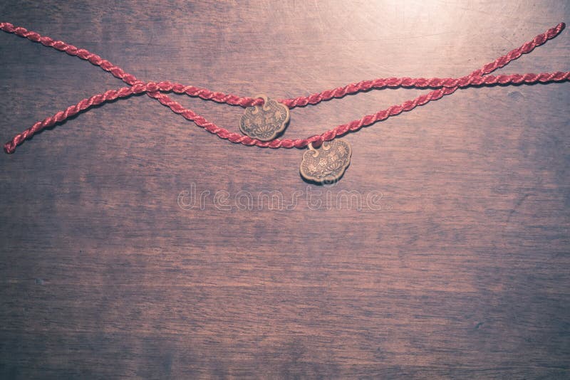 Red string lucky bracelet stock photo. Image of wooden - 117113062