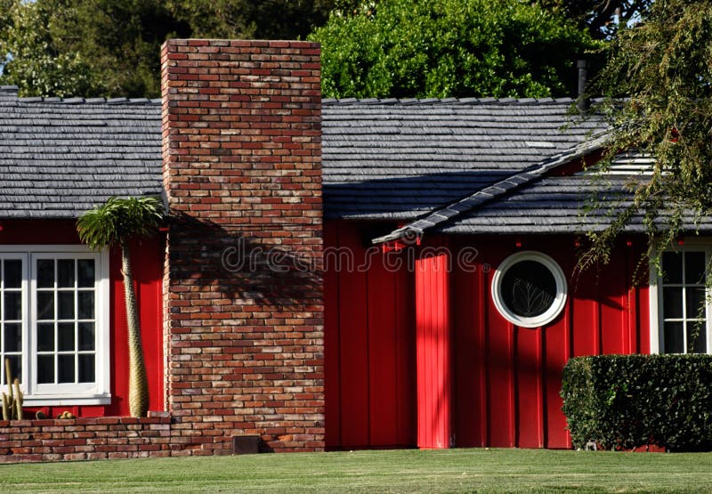 Red Suburban House with Round Window Stock Image - Image of circle ...