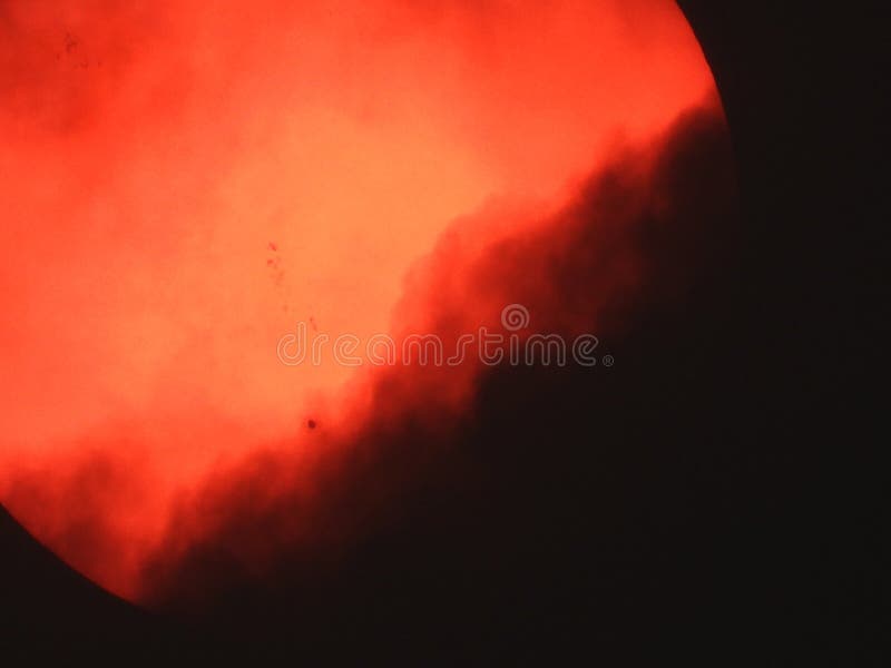 Red Sun Closeup through Smoke with Visible Sunspot Clusters Stock Photo ...