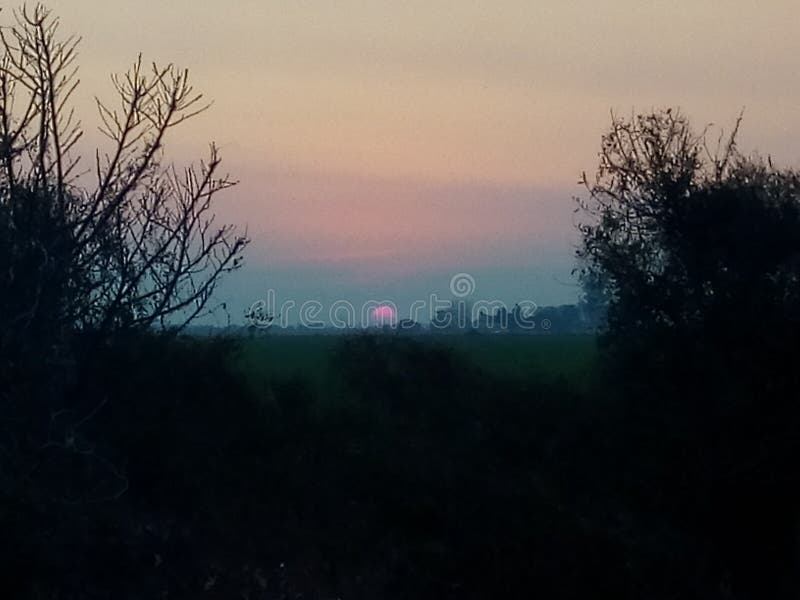 Red sun glow vanishing editorial photo. Image of evening - 194091256