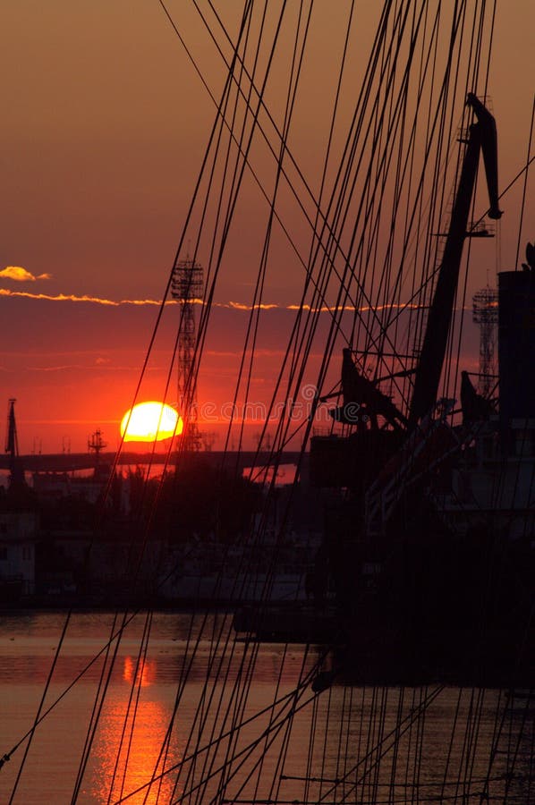 Red sun and port ropes stock photo. Image of sailing - 60844888