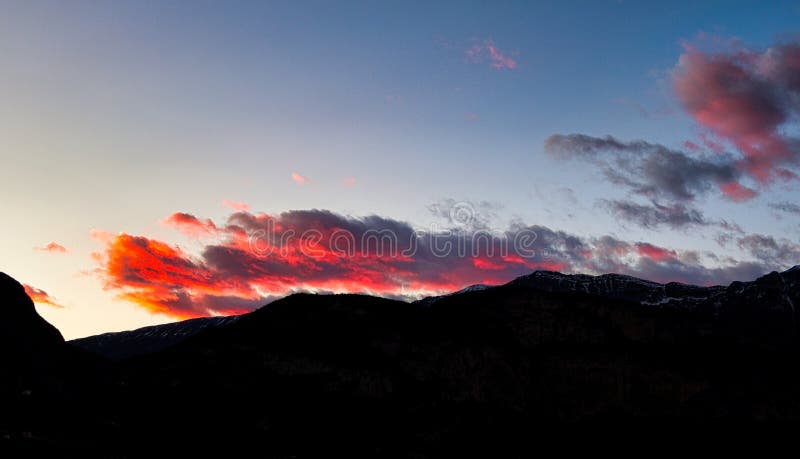 Red sunset of mountains stock photo. Image of scenery - 268446164