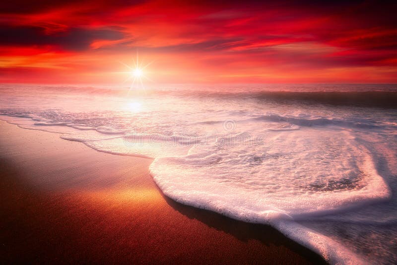Red Sunset on Beach with a Wave Stock Photo - Image of golden, ocean ...