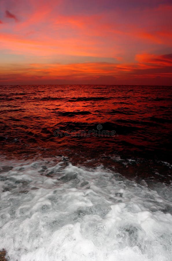 Red Sunset with Breaking Water. Stock Image - Image of exotic, scenery ...