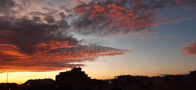 Red sunset at the city stock image. Image of skyline - 161663663
