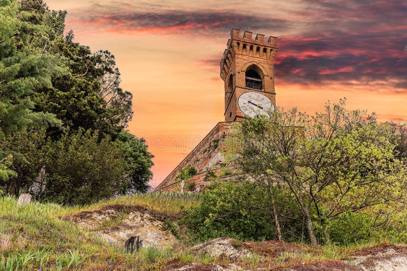 Red sunset on clock tower stock photo. Image of rocky - 115268564