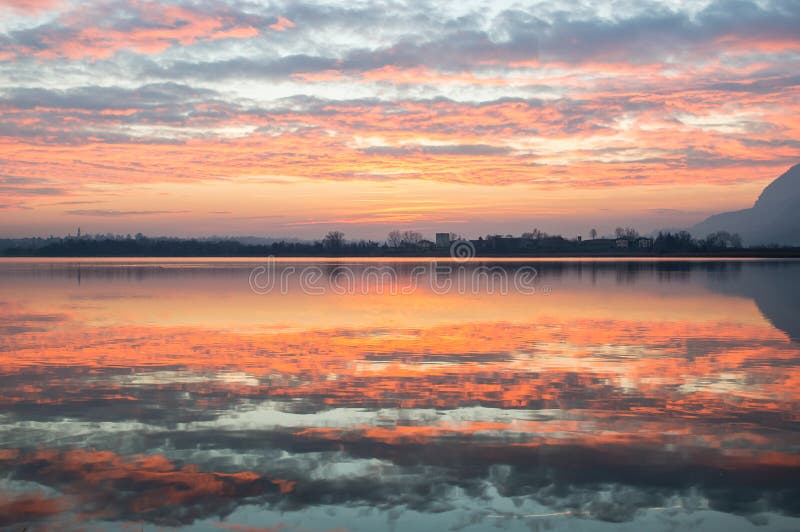 Red sunset stock image. Image of lake, sunset, water - 77491129