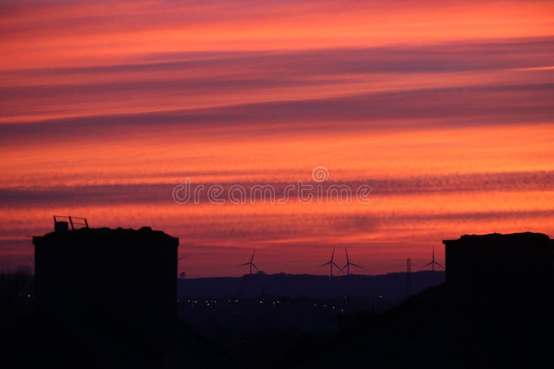 Red sunset stock photo. Image of sunset, rooftops, silhouetted - 89473100