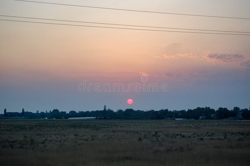Red Sunset Over the Field Landscape Stock Photo - Image of outdoors ...