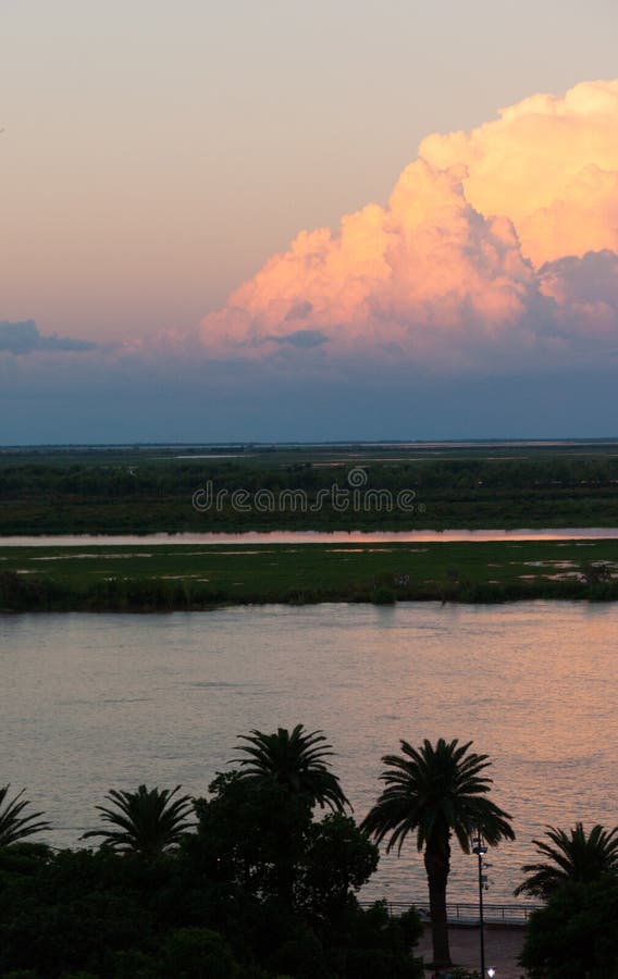 Colorful and Cloudy Sunset at the Riverside Stock Photo - Image of ...