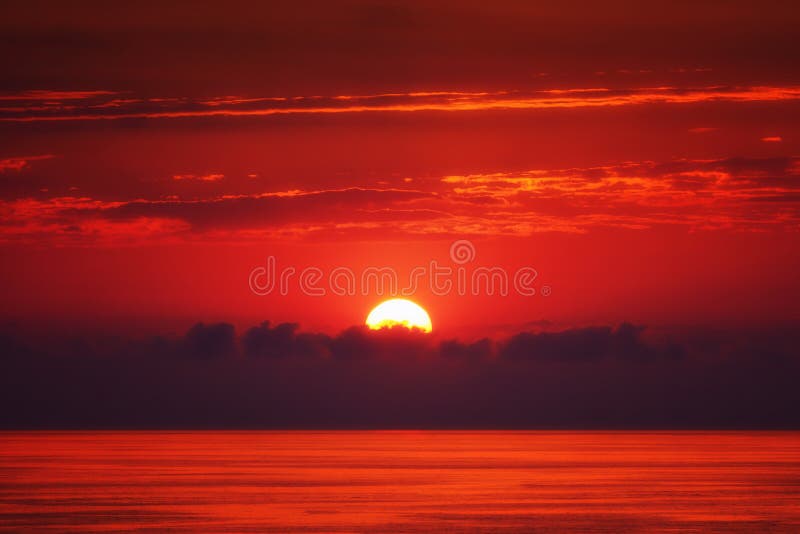 Red sunset over sea stock photo. Image of horizon, evening - 72247528