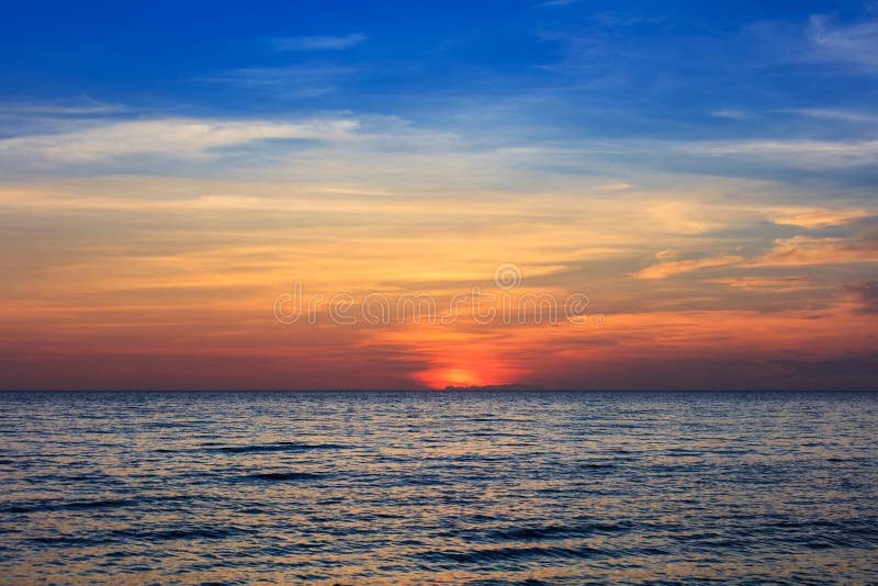 Red sunset over the sea stock image. Image of sunrise - 133016903