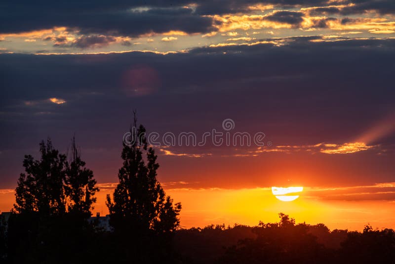 Red Sunset Over Trees with Clouds Stock Photo - Image of destination ...