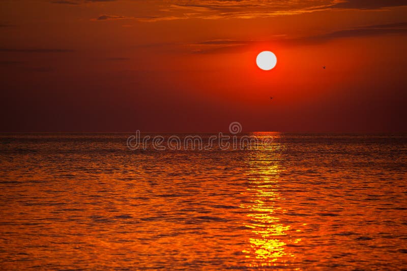Red sunset over water stock image. Image of orange, silhouette - 70046783