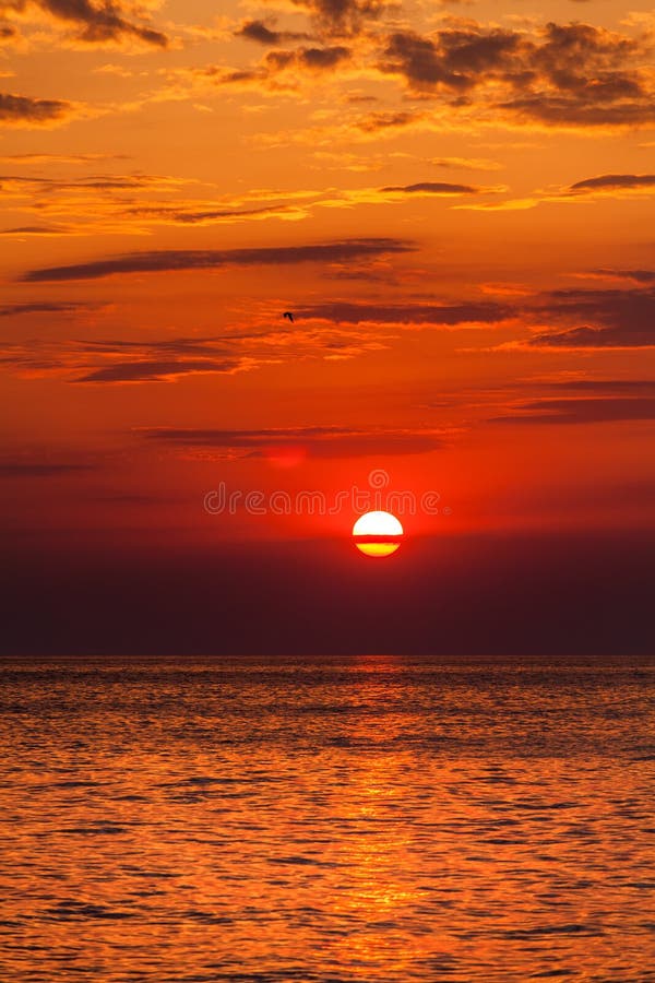 Red sunset over water stock image. Image of abstract - 70046809