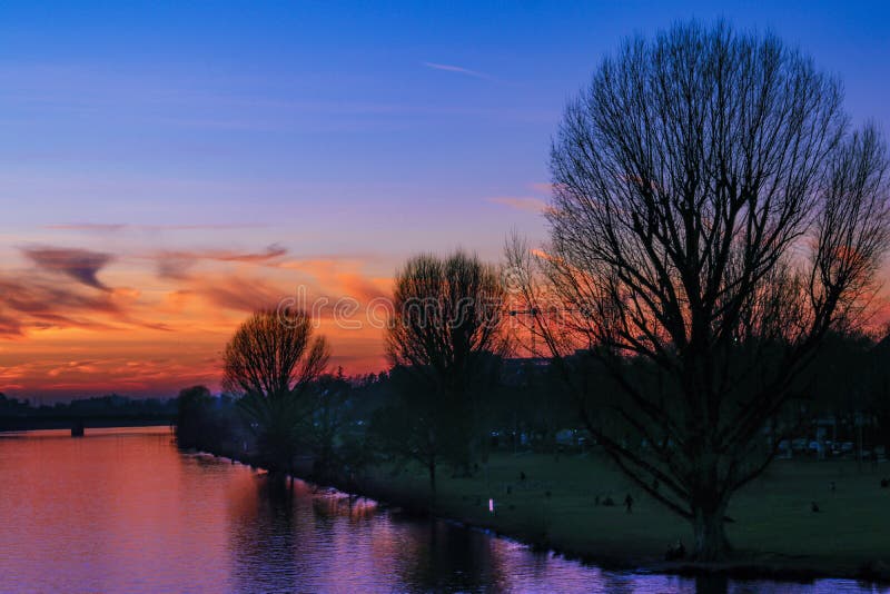 Red Sunset on the River. Winter without Snow. Stock Image - Image of ...