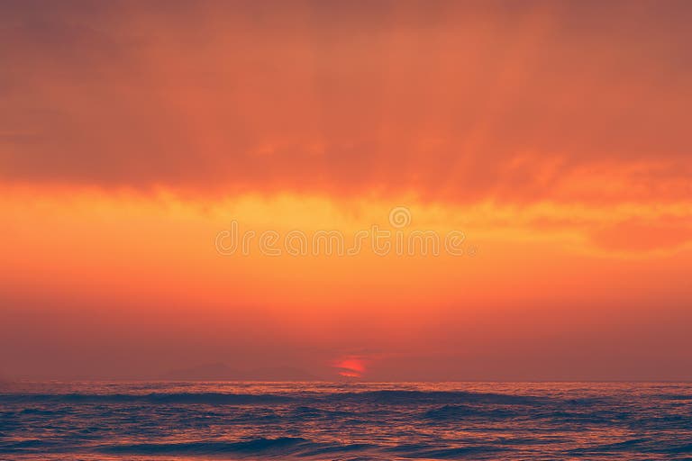 Red sunset with sun beams stock photo. Image of rays - 97294792