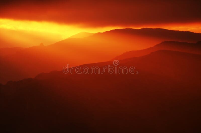 Red sunset stock image. Image of mountain, color, peaceful - 54185093