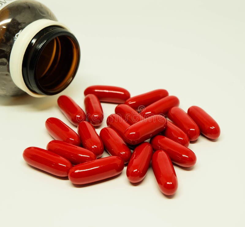 Red Supplement Tablets and the Bottle Stock Image - Image of brown ...