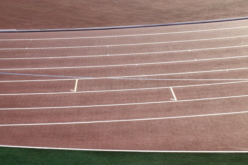 The Red Surface of the Old Running Track at the Stadium Stock Photo ...
