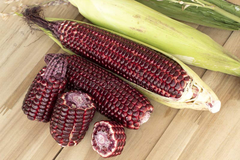 Red Sweet Corn on Wood Background, Siam Ruby Queen Corn Stock Photo ...