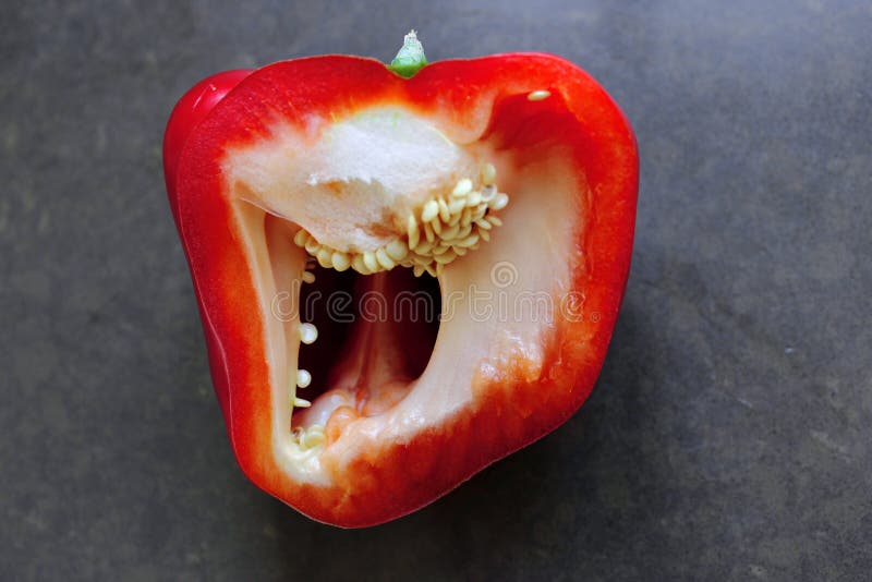 Red Sweet Pepper Cut in Half. a Section of Red Bell Pepper. Stock Photo ...