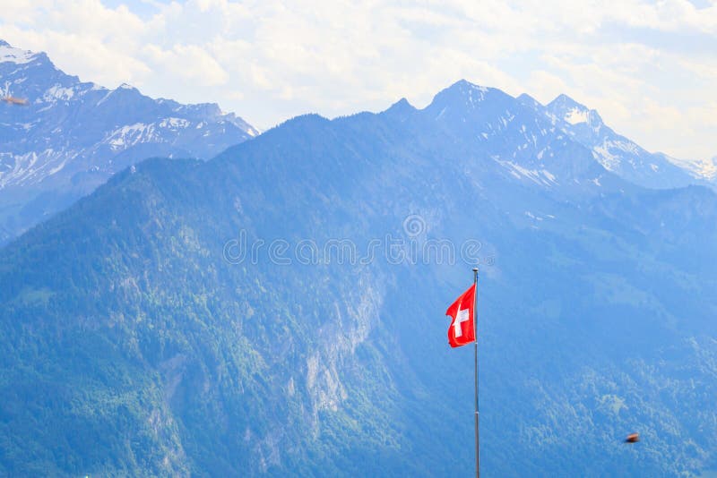 Red Swiss Flag Over Swiss Alps Background Stock Image - Image of serene ...