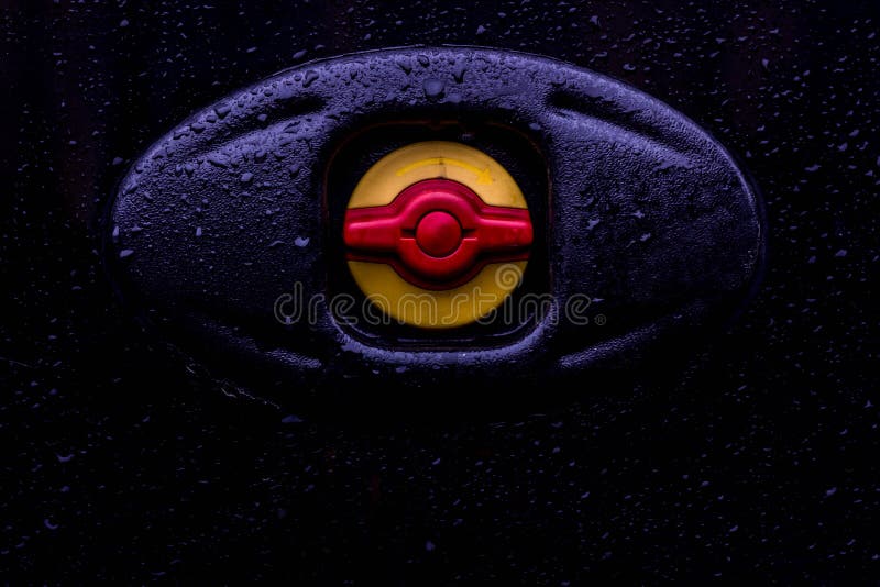 Red Switch on a Yellow Background, Black Metal with Water Drops Stock ...