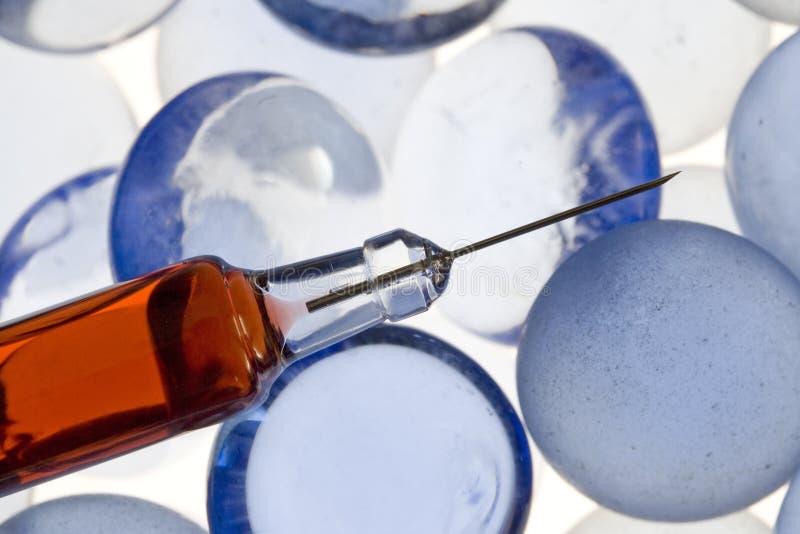 Red syringes in blue stock image. Image of apothecary - 4859253