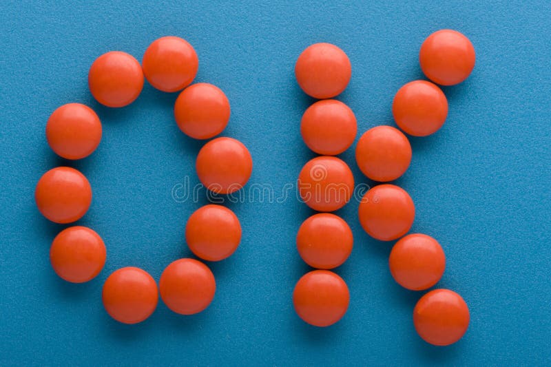 Red Tablet on blue stock photo. Image of medical, dose - 12334774