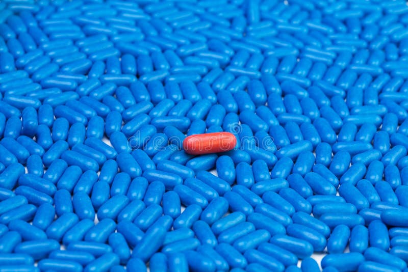 Red tablet and blue pills stock image. Image of bright - 30969035