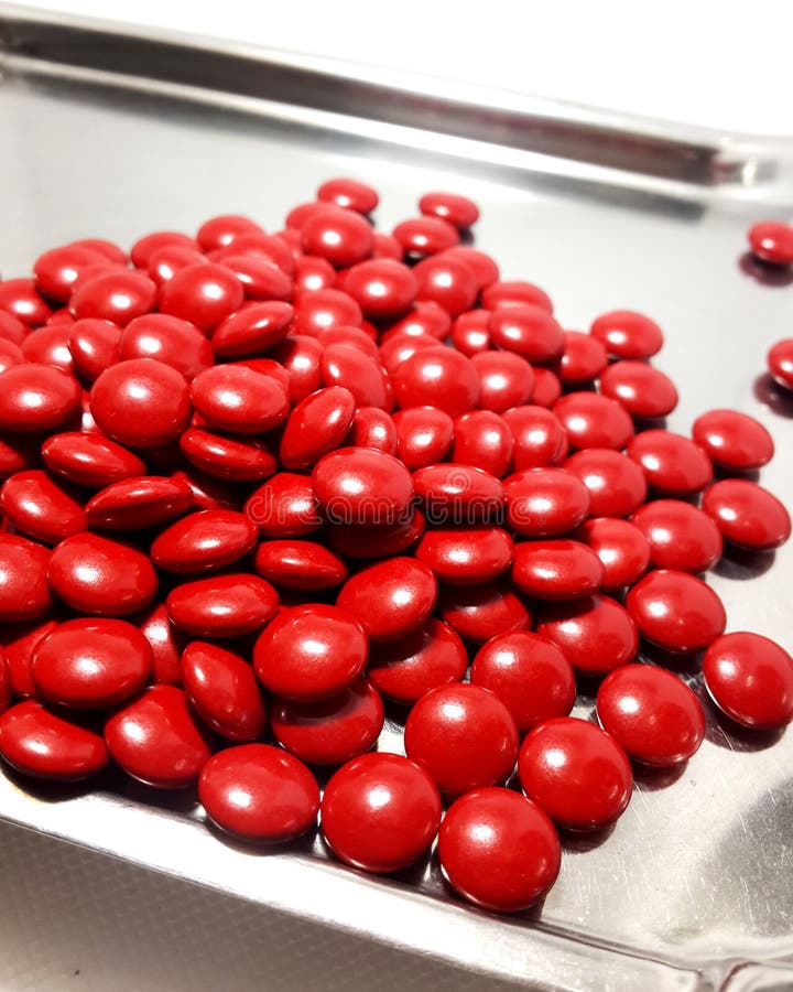 Red Tablets on Countertop Tray Stock Image - Image of pill, drug: 115511281
