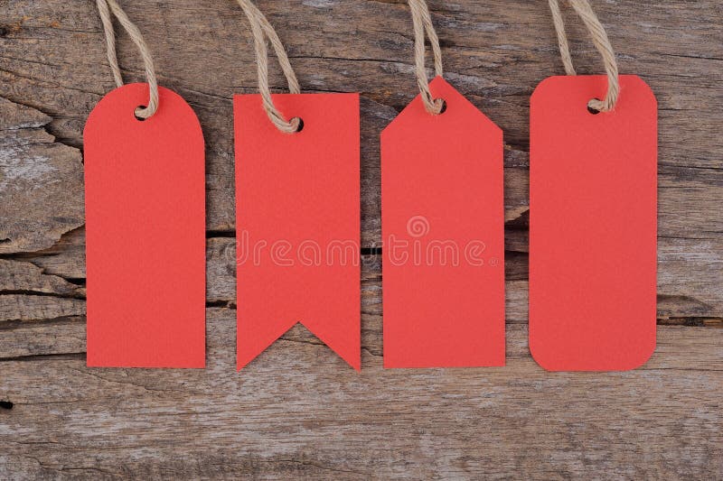 4 Red Tags on Wood Table for Sale and Text Stock Image - Image of ...