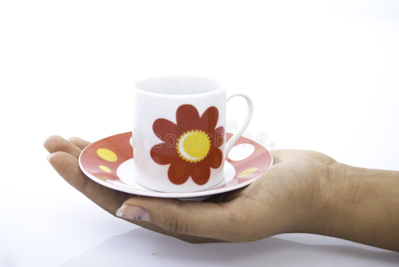 Red tea cup hold in hands stock image. Image of porcelain - 25231509