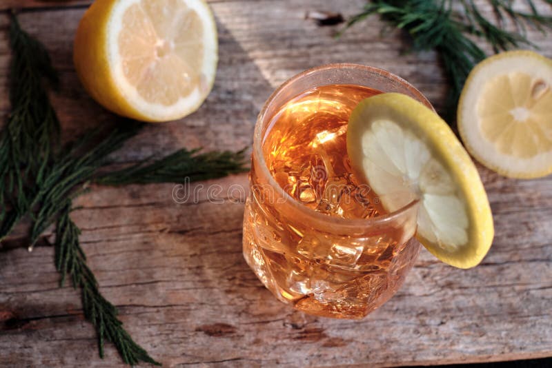 Red tea with ice and lemon stock photo. Image of lemons - 185343302