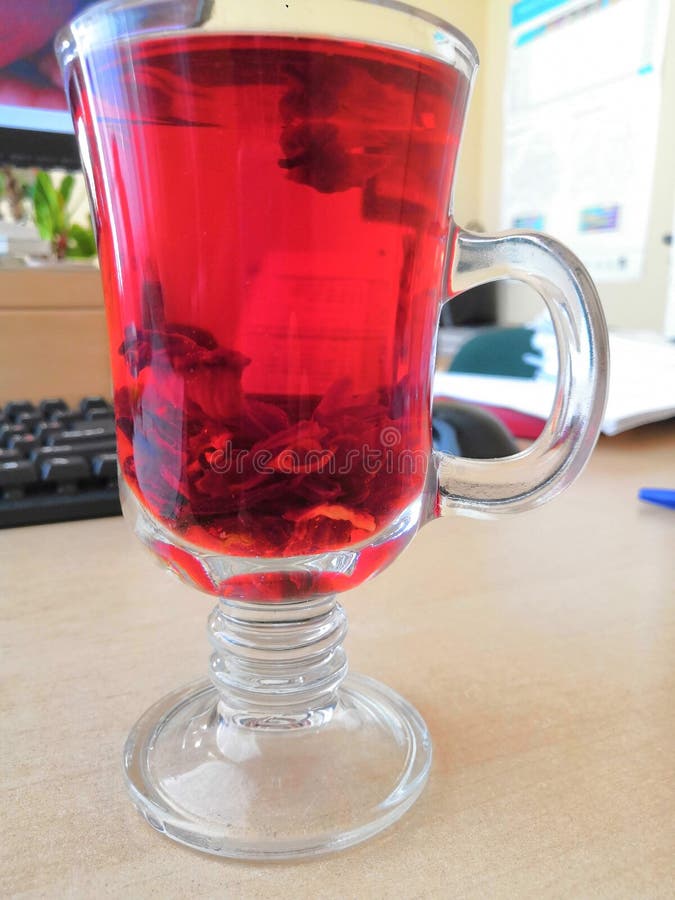 Red tea time at the office stock photo. Image of smacapbright - 173393870