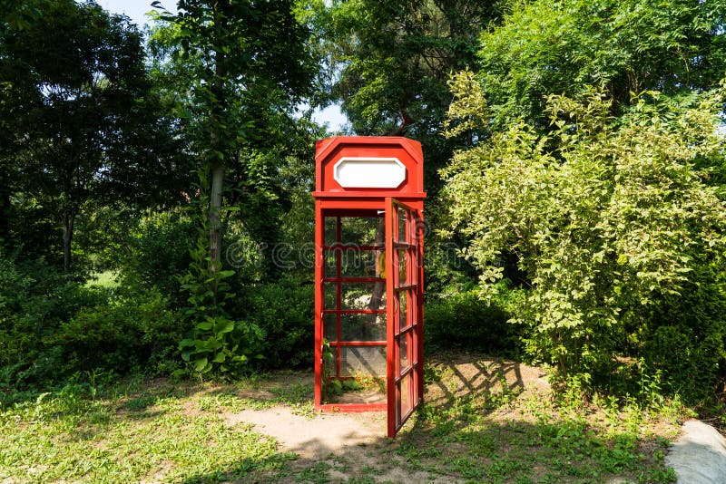 Red Telephone Box in the Middle of the Forest. Vintage Phone Booth ...