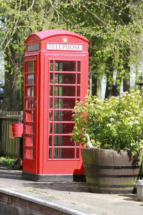 Old Telephone Box on a Platform As Statue, these Types are Not Used ...