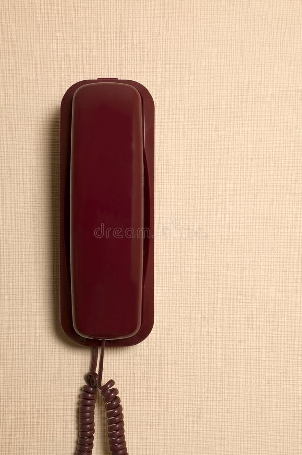 Red telephone on wall stock image. Image of telecommunication - 11579807