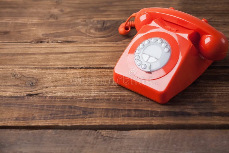 Red Telephone on Wooden Table Stock Photo - Image of desk, wooden: 56800466
