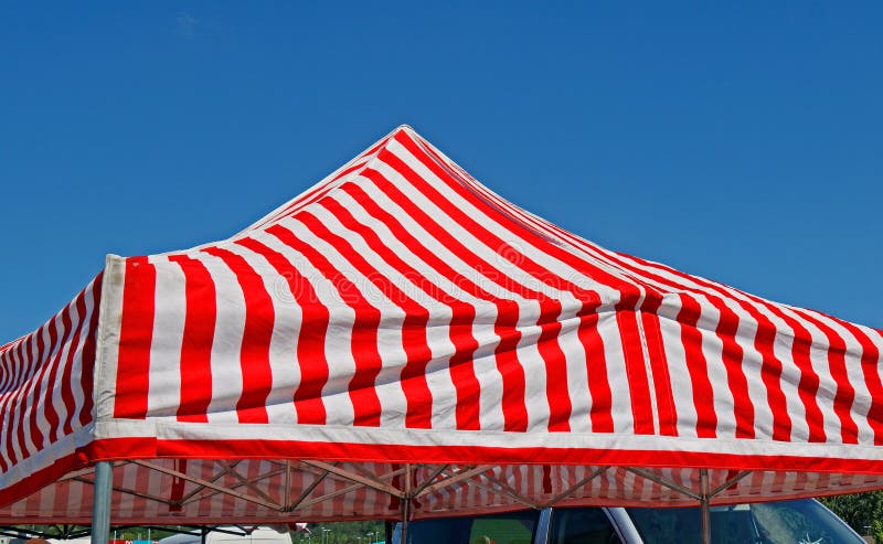 Red tent against blue sky stock photo. Image of roof - 228460540